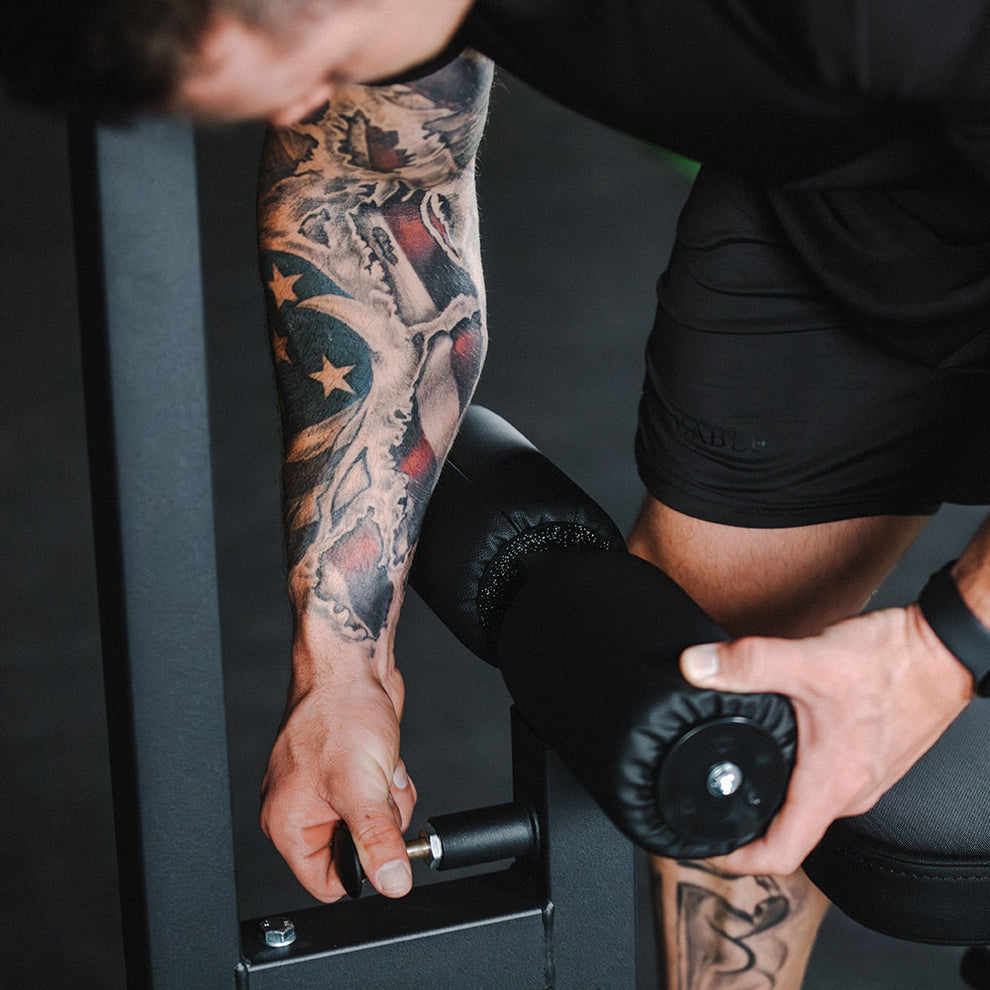 Plate Loaded Lat Pulldown & Low Row Machine | Titan Fitness